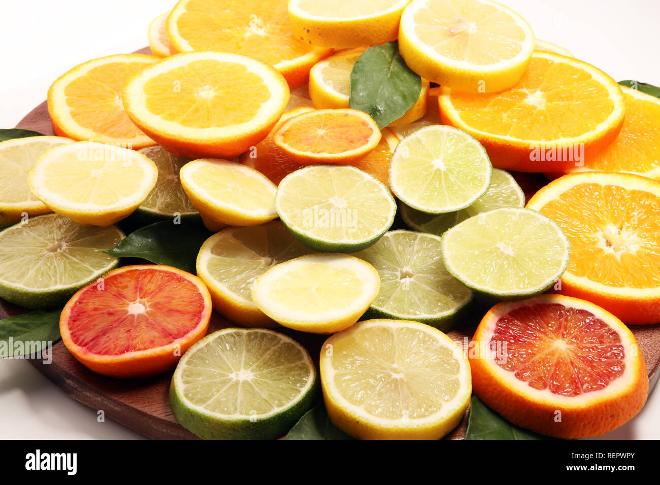 Citrus fruits with orange, lemon, grapefruit and lime on white ...
