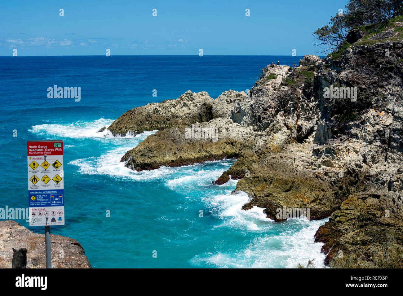 Rocks and warning sign at North Gorge Walk, Point Lookout, North ...