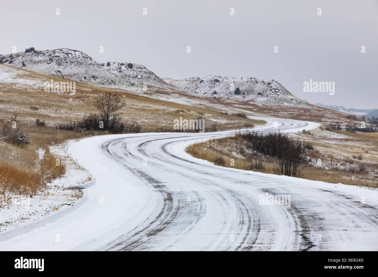 Scenic Loop Road curving through the snowy badlands in November, South ...