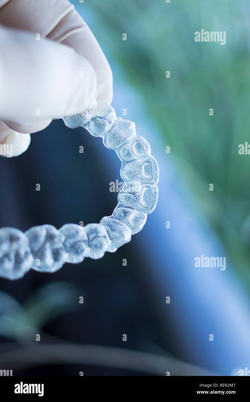 Invisible dental teeth aligners brackets used to align each tooth in ...