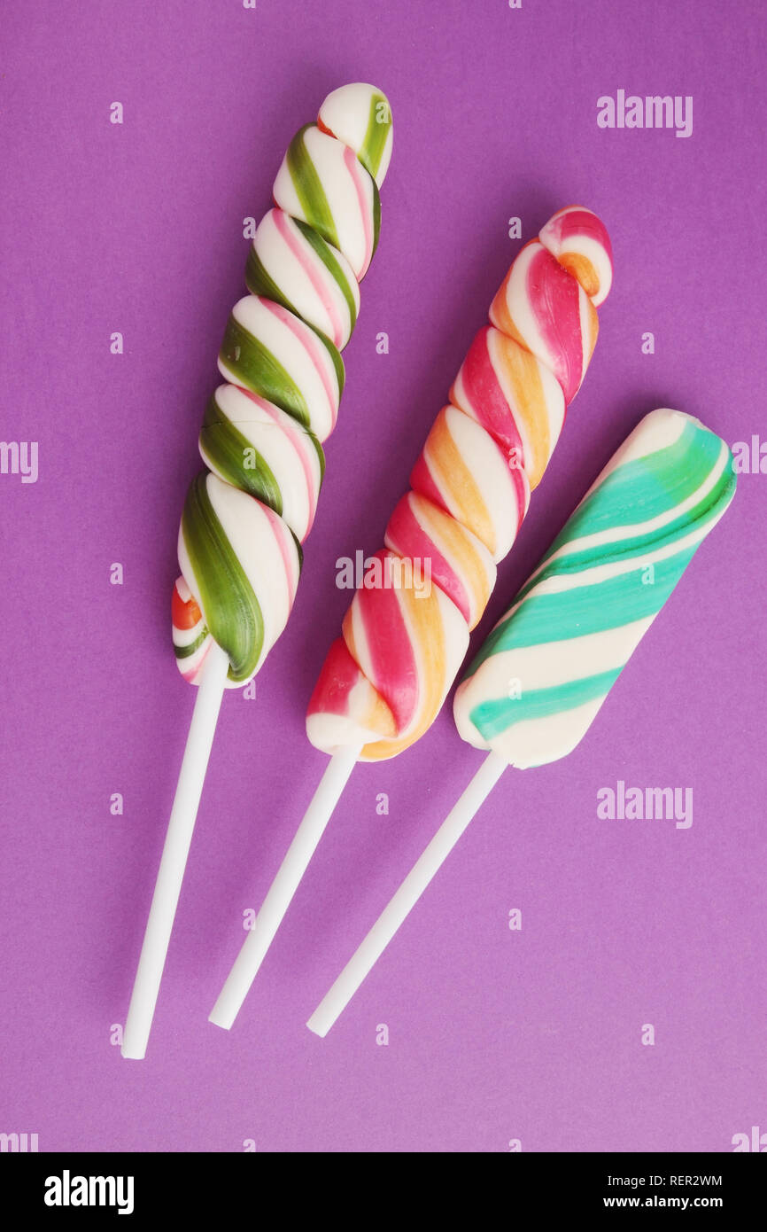 three large sweet candy on a stick Stock Photo - Alamy