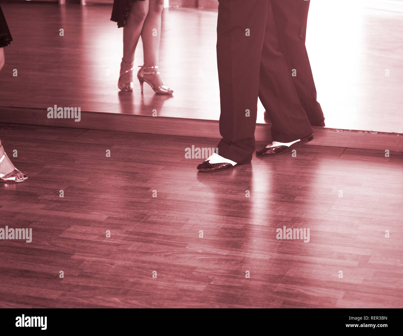 Ballroom dance couple of dancers and teachers in studio school dancing ...