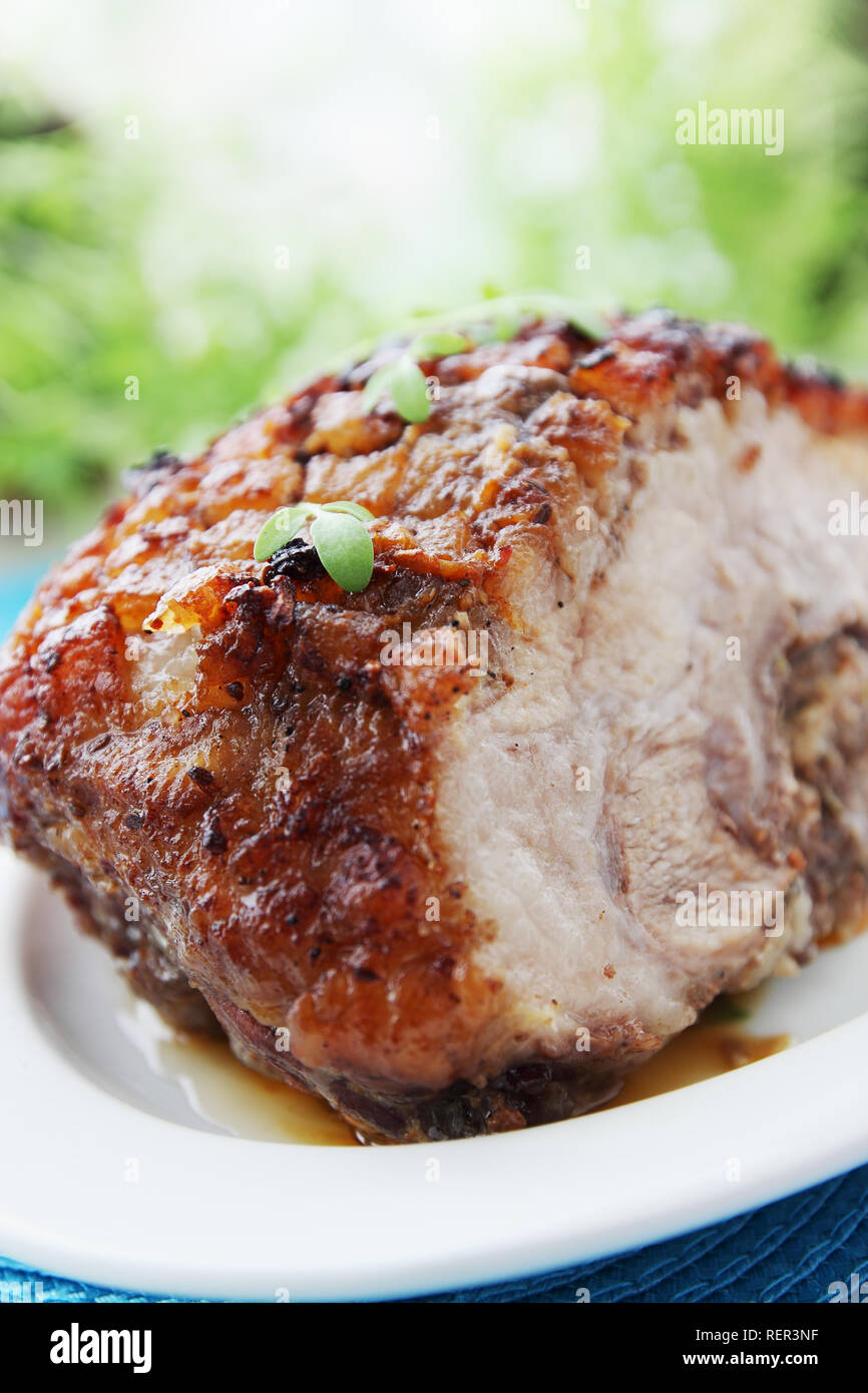 Roasted pig meat to the Easter table Stock Photo - Alamy