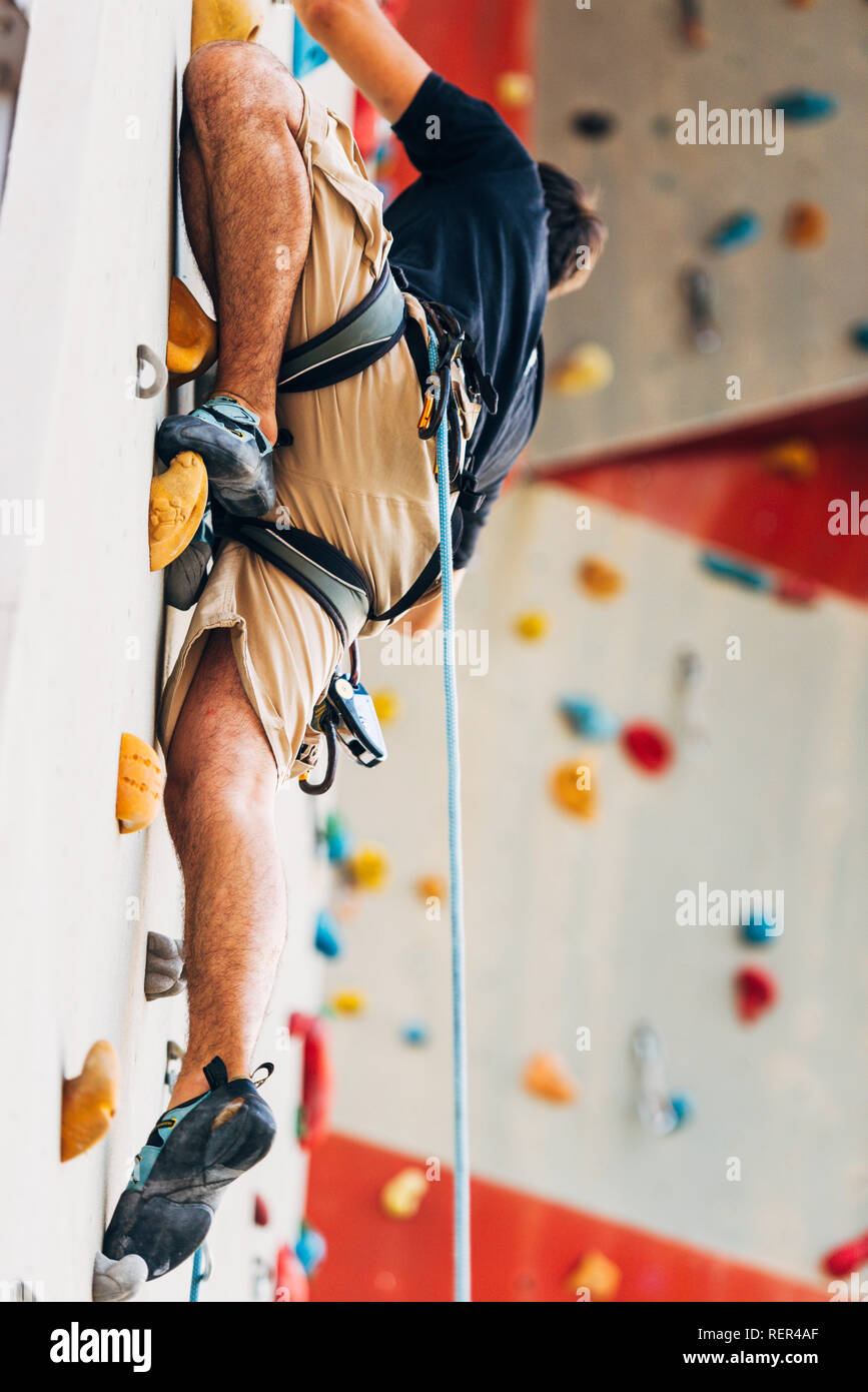 Active lifestyle and bouldering climbing, reaching the top concept ...