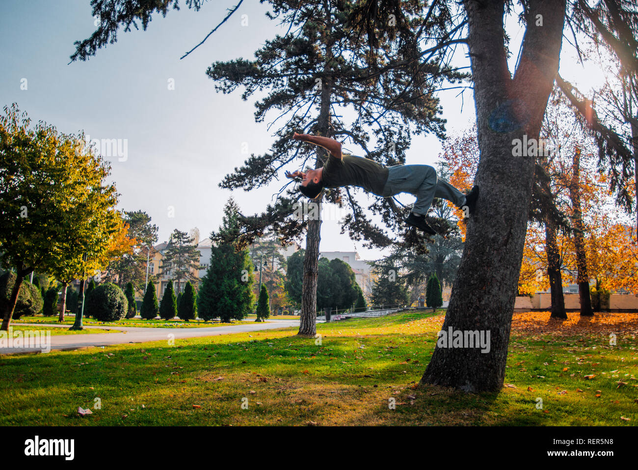 Training day of young traceur while doing parkour jumping Stock Photo ...