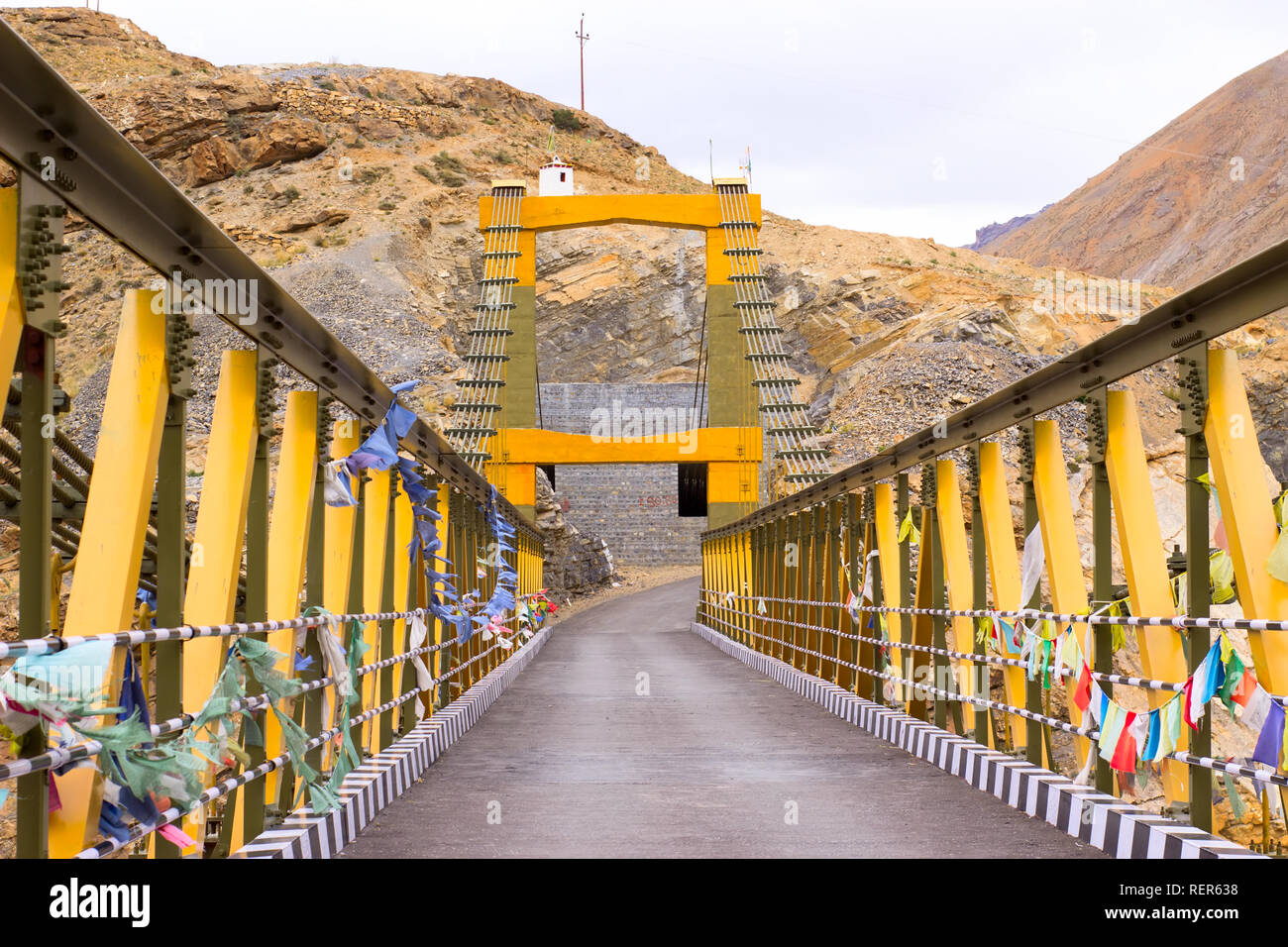Safety yellow bridge in himalayan mountains. Travel concept Stock Photo ...