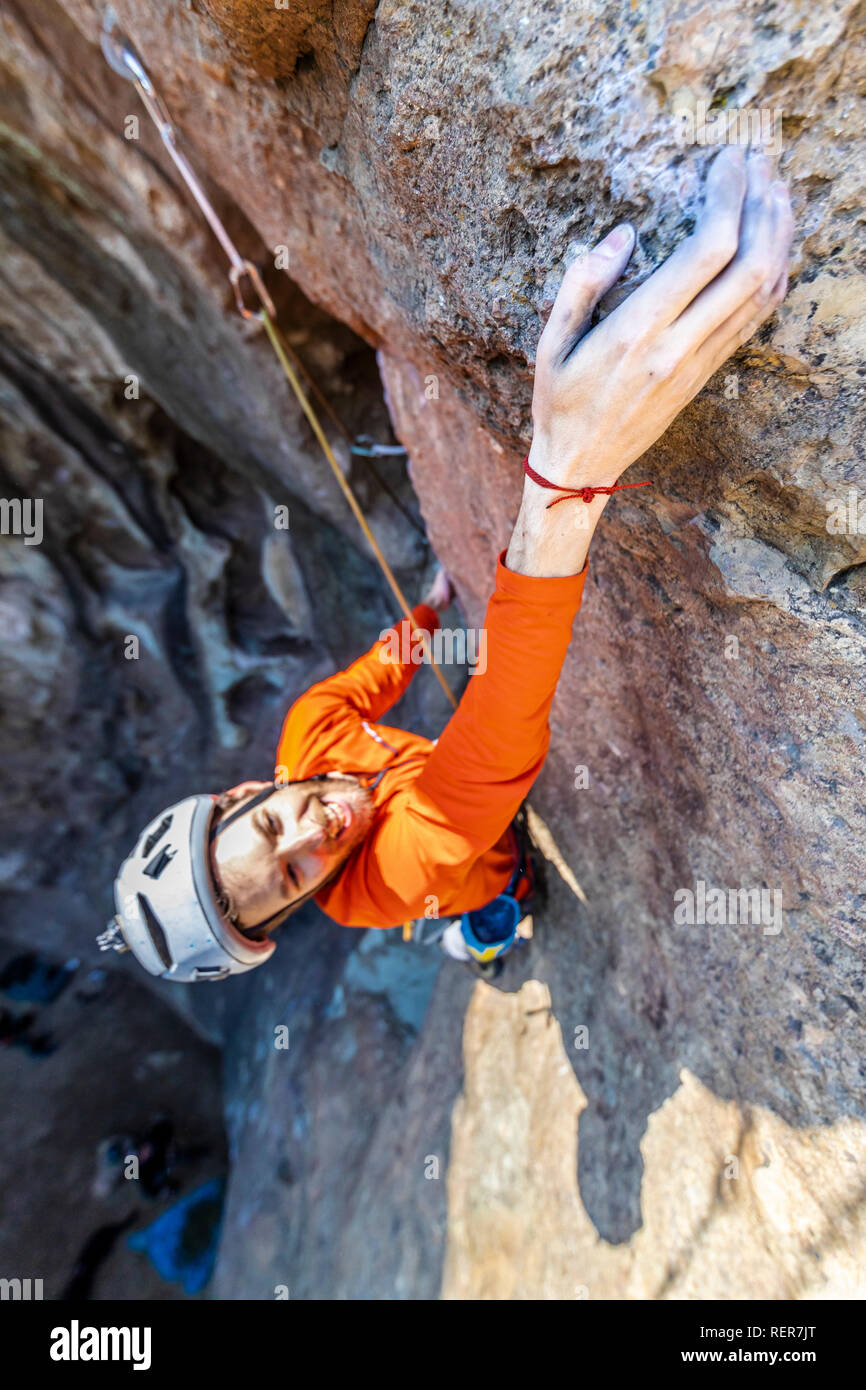 Practicing rock climbing extreme sport inside Andes mountains at a rock ...