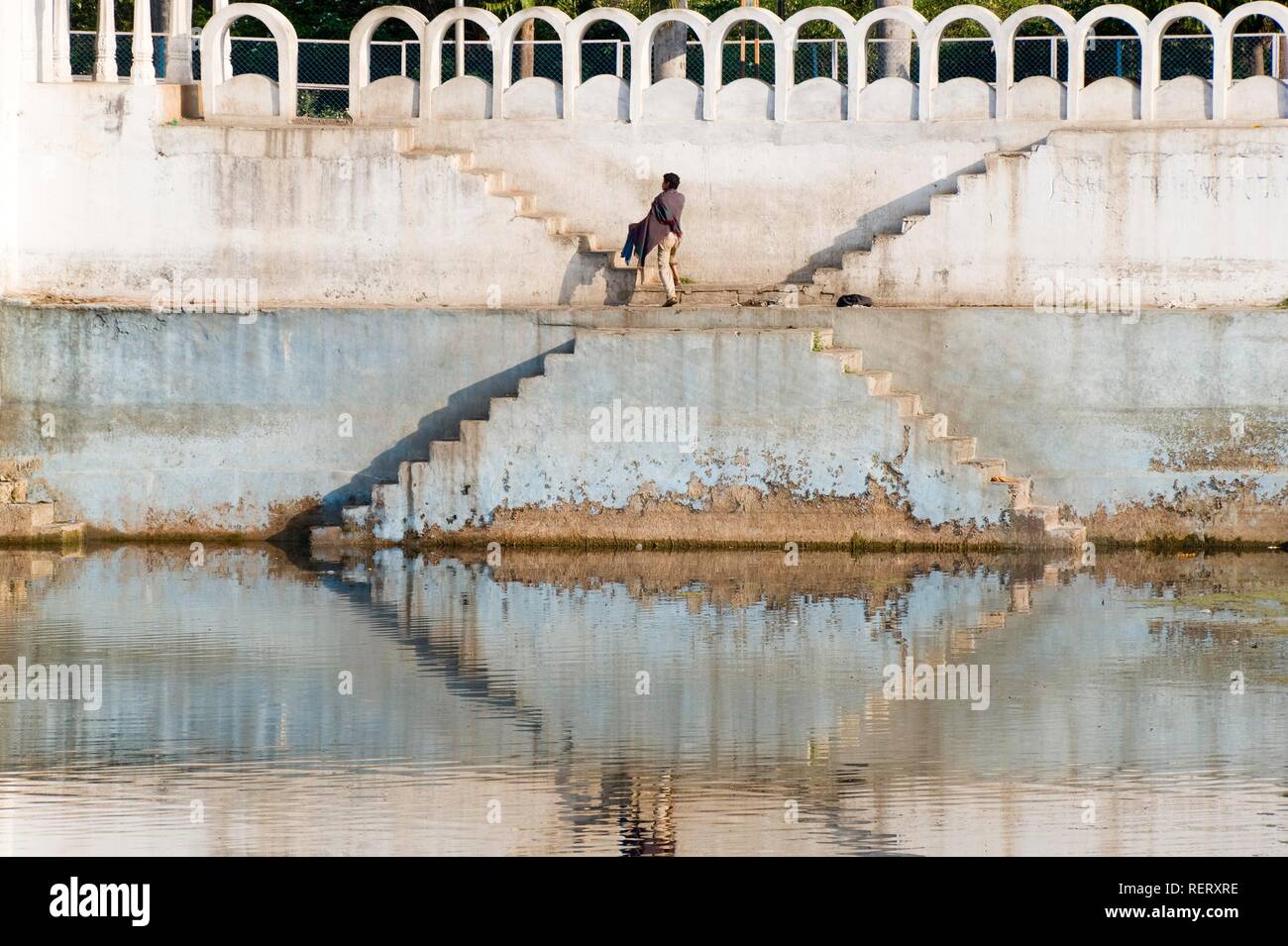 Local man on a ghat, steps, Udaipur, Rajasthan, India, South Asia Stock ...