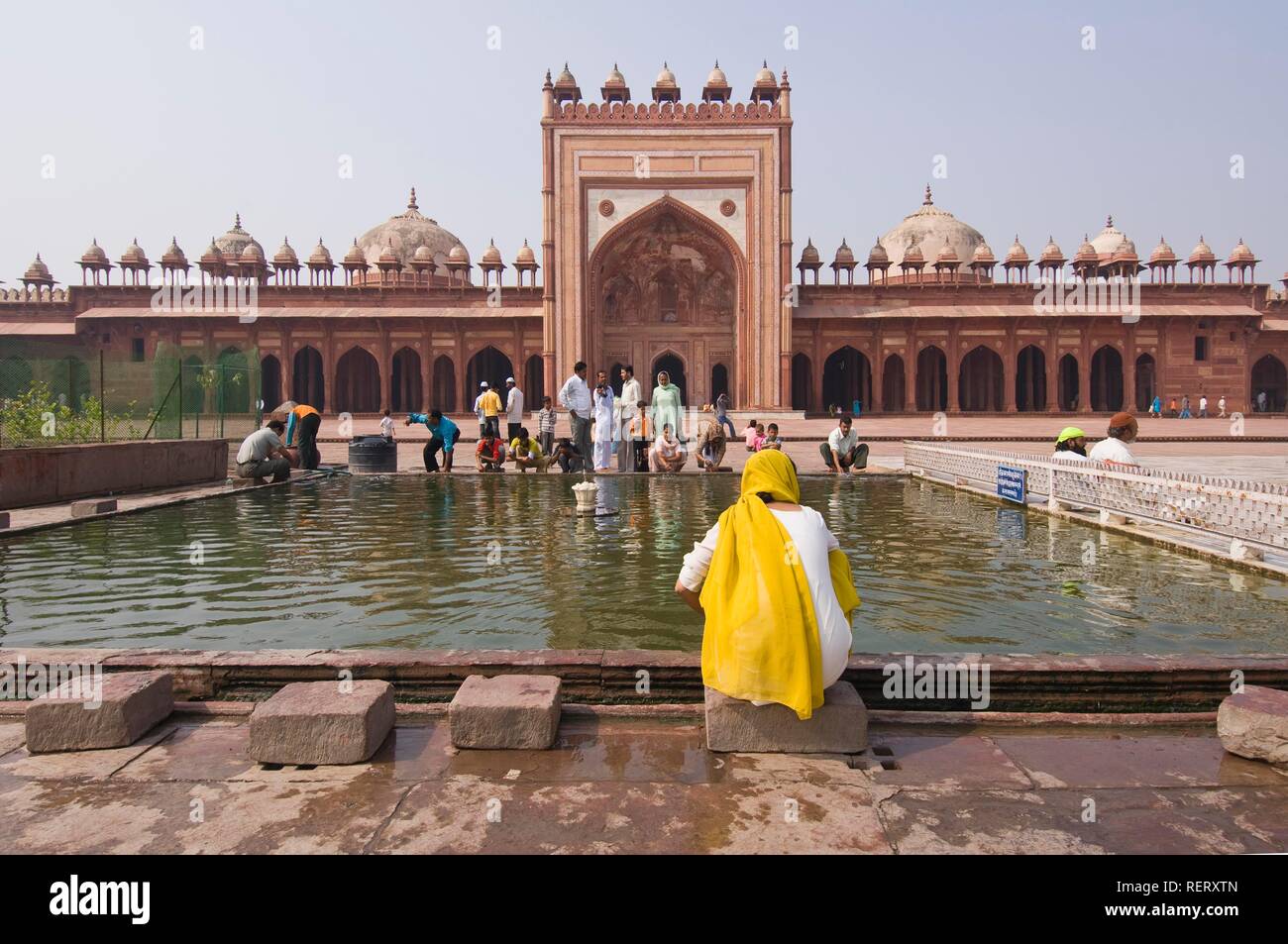 Jama Masjid Mosque, Indian pilgrims making their ritual ablution in the ...