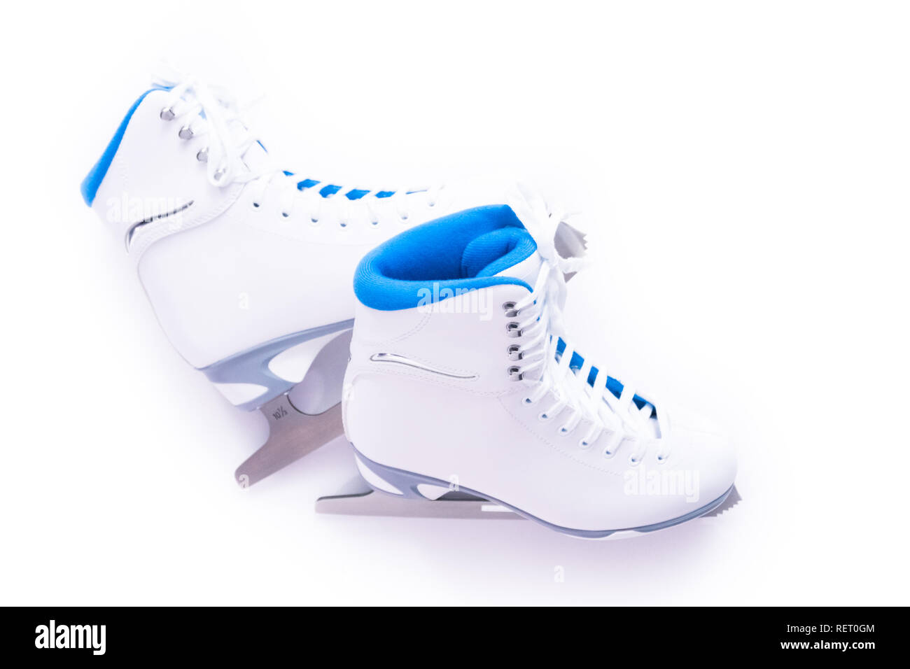 Flat lay. New white figure skates on a white background Stock Photo - Alamy
