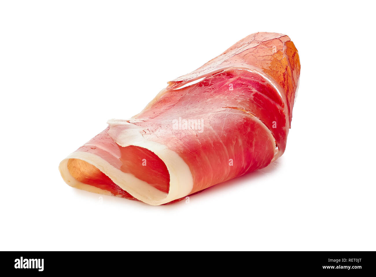 Folded jamon of ham slice on white Stock Photo - Alamy