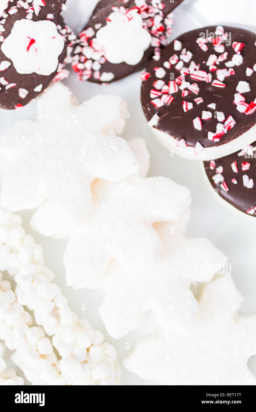 Close up view. Variety of marshmallow toppings with peppermint and ...