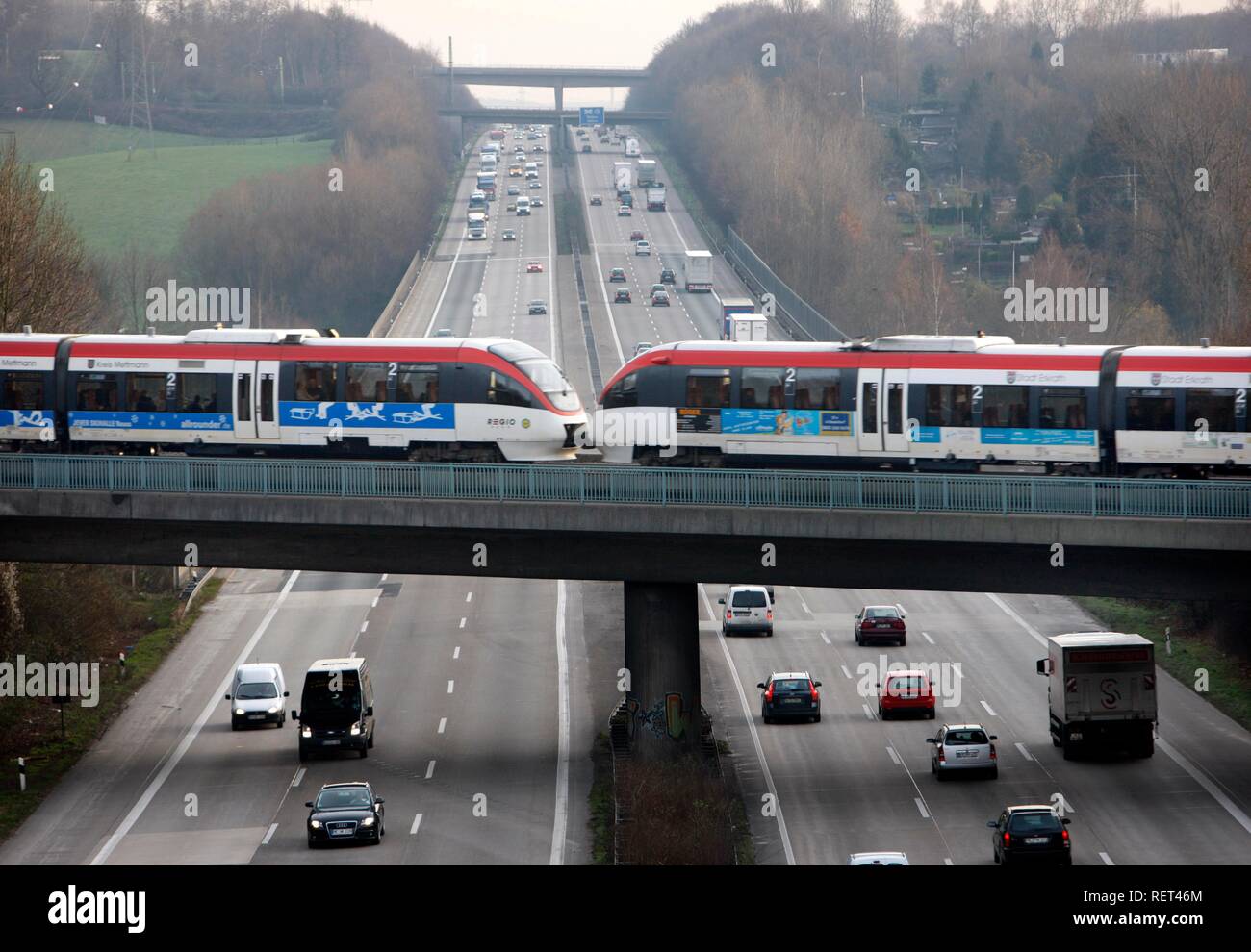 Passenger train crossing motorway hi-res stock photography and images ...