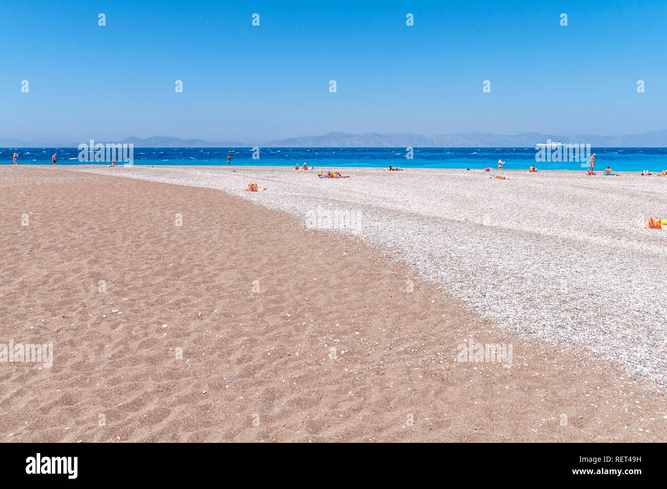 RHODES, GREECE - September 5: People on the bech on summer day lie and ...