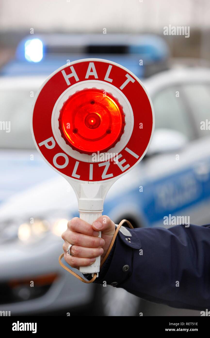 Police stop sign for stopping cars, Duesseldorf, North Rhine-Westphalia ...