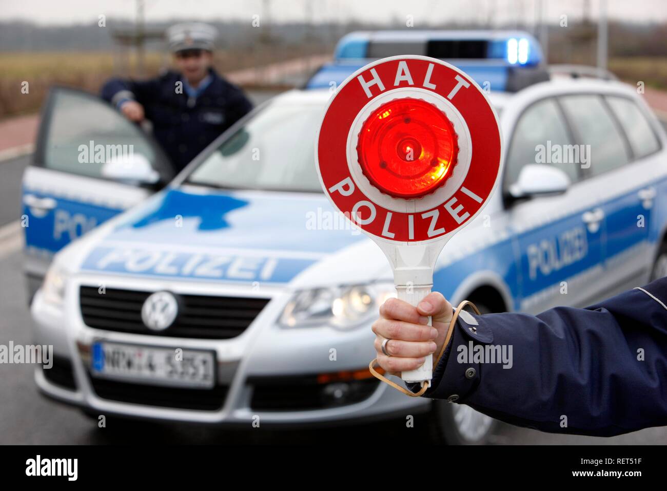Police stop sign for stopping cars, Duesseldorf, North Rhine-Westphalia ...