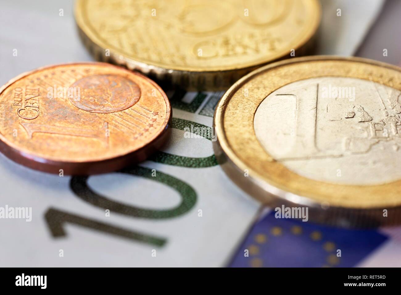 Euro coins and banknote Stock Photo - Alamy