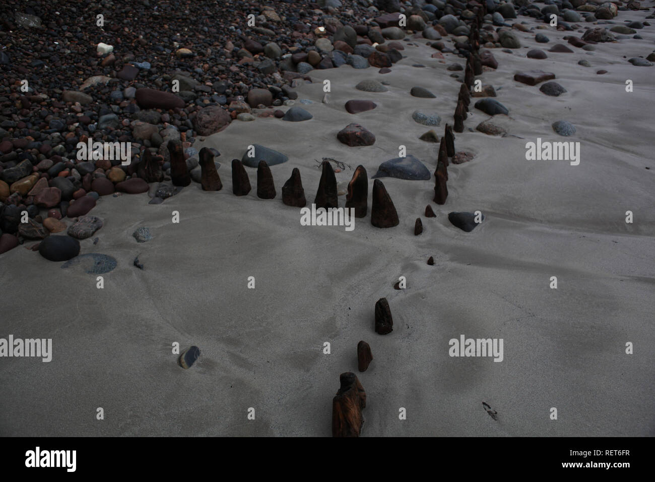 Old Eroded Wooden Pier Points. Golspie Beach Sutherland Scotland Stock ...