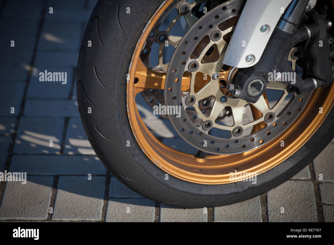 Front wheel and drive of a racing motorcycle. Motorcycle sport. FIM ...