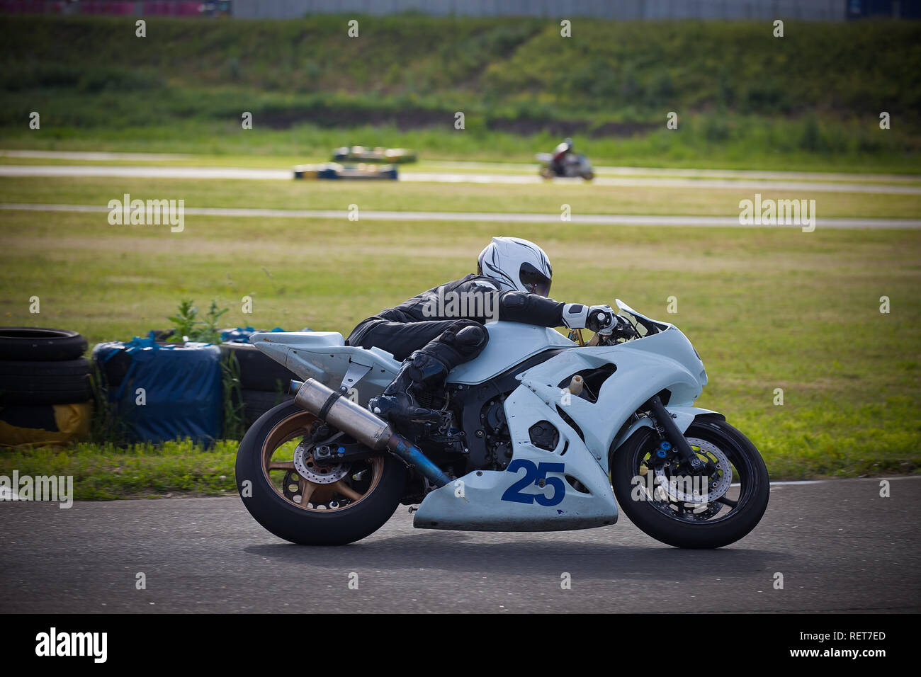 Moto-athlete on the racetrack. Motorcycle sport. FIM Road Racing Stock ...