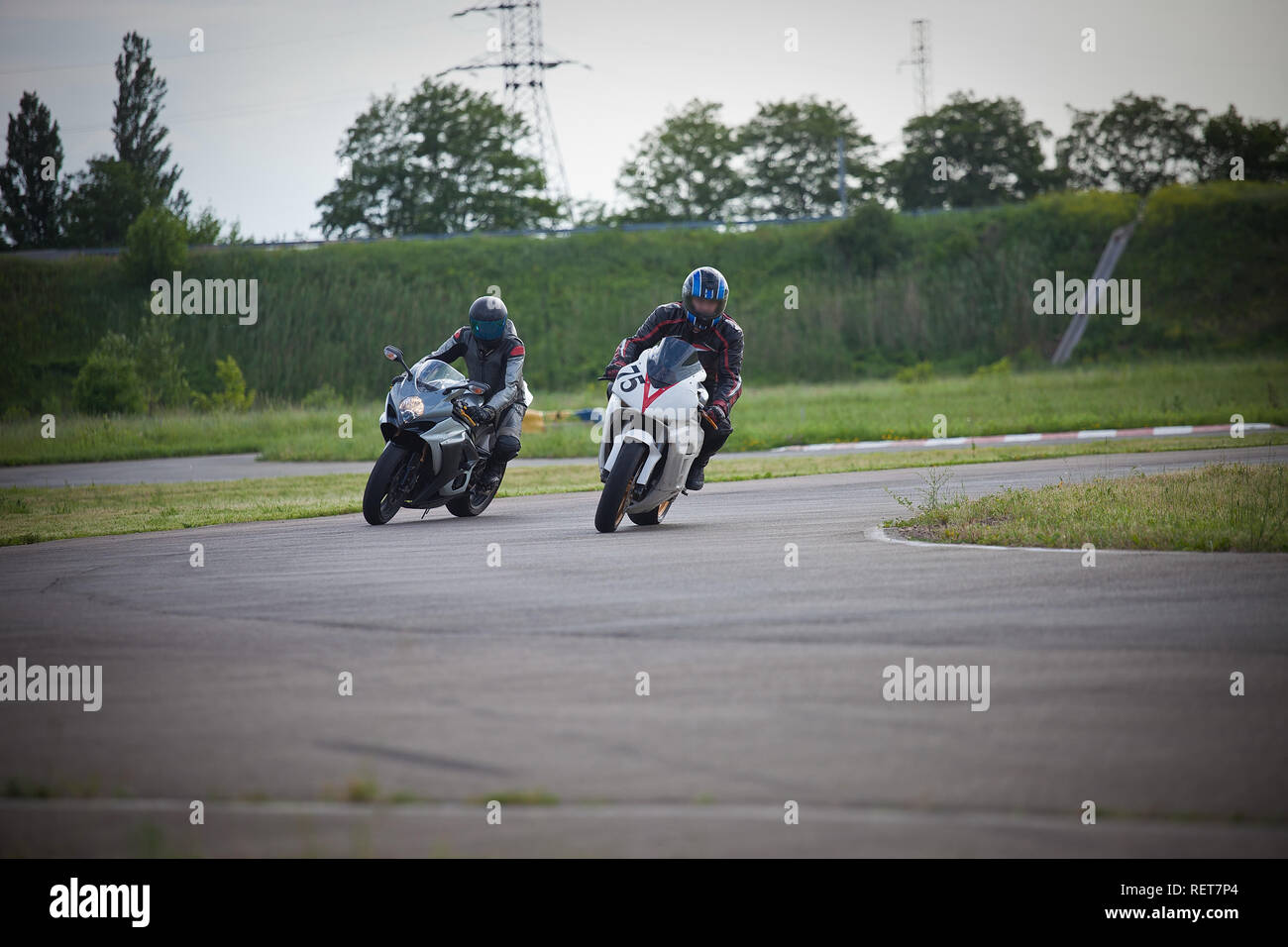 Race between two motorcycle athletes. Motorcycle sport. FIM Road Racing ...