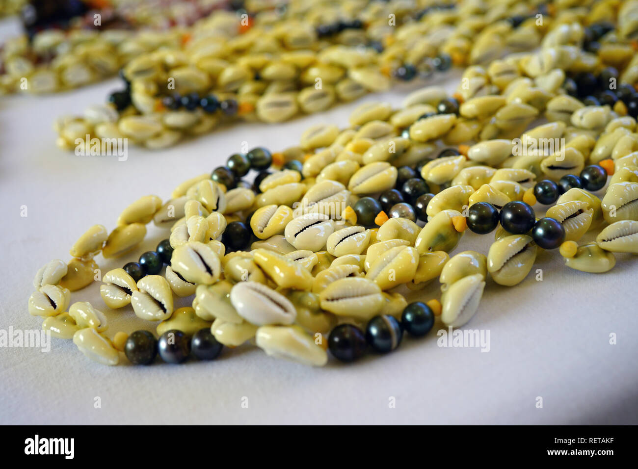 Traditional craft jewelry made with colorful shells from the Tuamoto ...