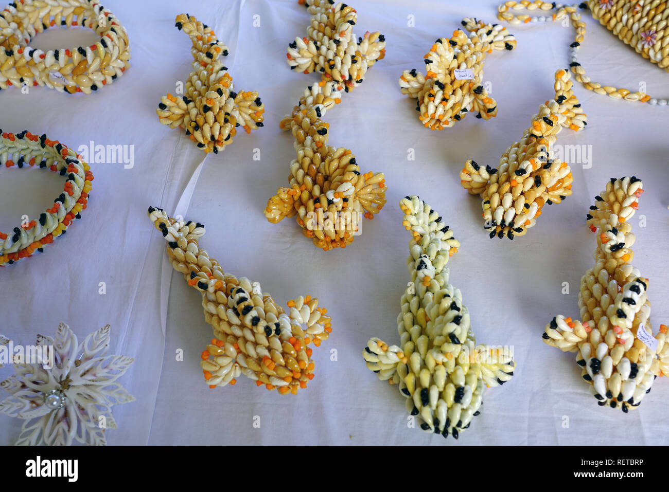 Traditional craft jewelry made with colorful shells from the Tuamoto ...