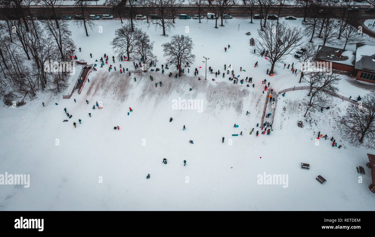 Kids Sledding in Chicago via Drone Stock Photo - Alamy