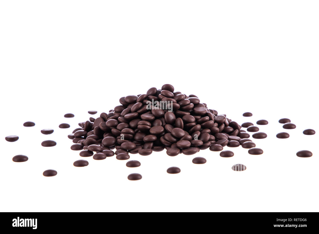 Chocolate Chips pile or small candies on White Background Stock Photo ...