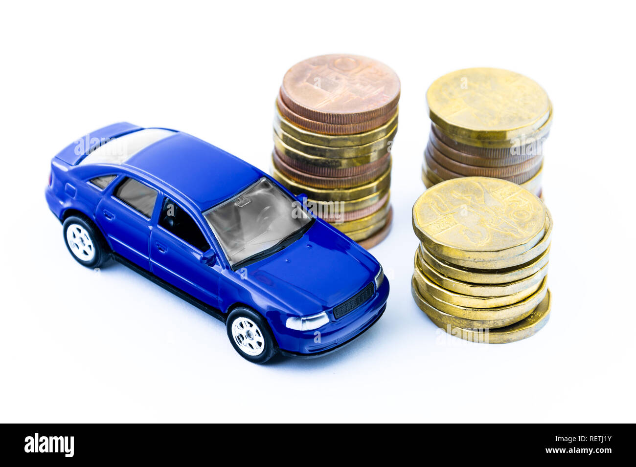 Model of blue car and coins on a white background. Isolated toy car and ...
