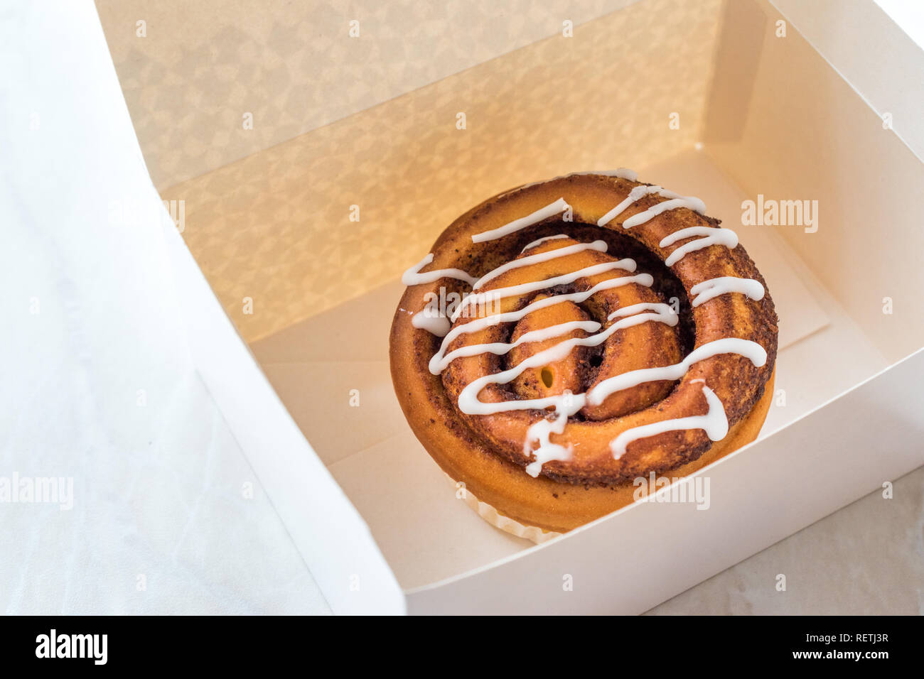 Cinnabon box hi-res stock photography and images - Alamy