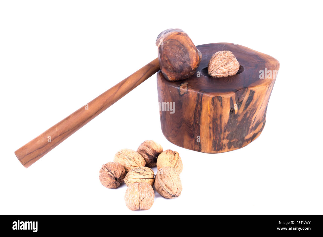 man breaking a walnut in a nutshell Stock Photo - Alamy