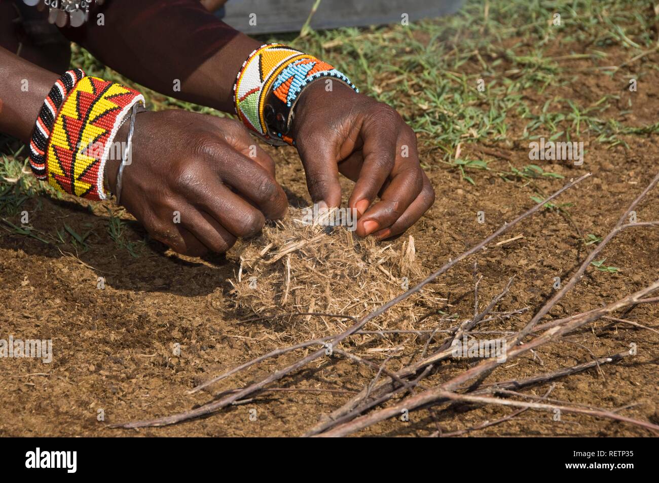 Masai starting fire hi-res stock photography and images - Alamy