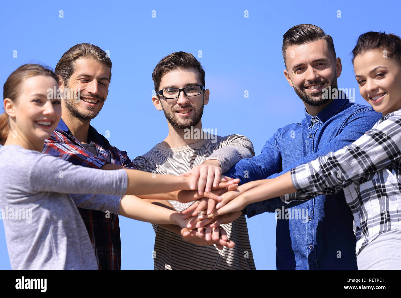 group of young people shows their unity Stock Photo - Alamy