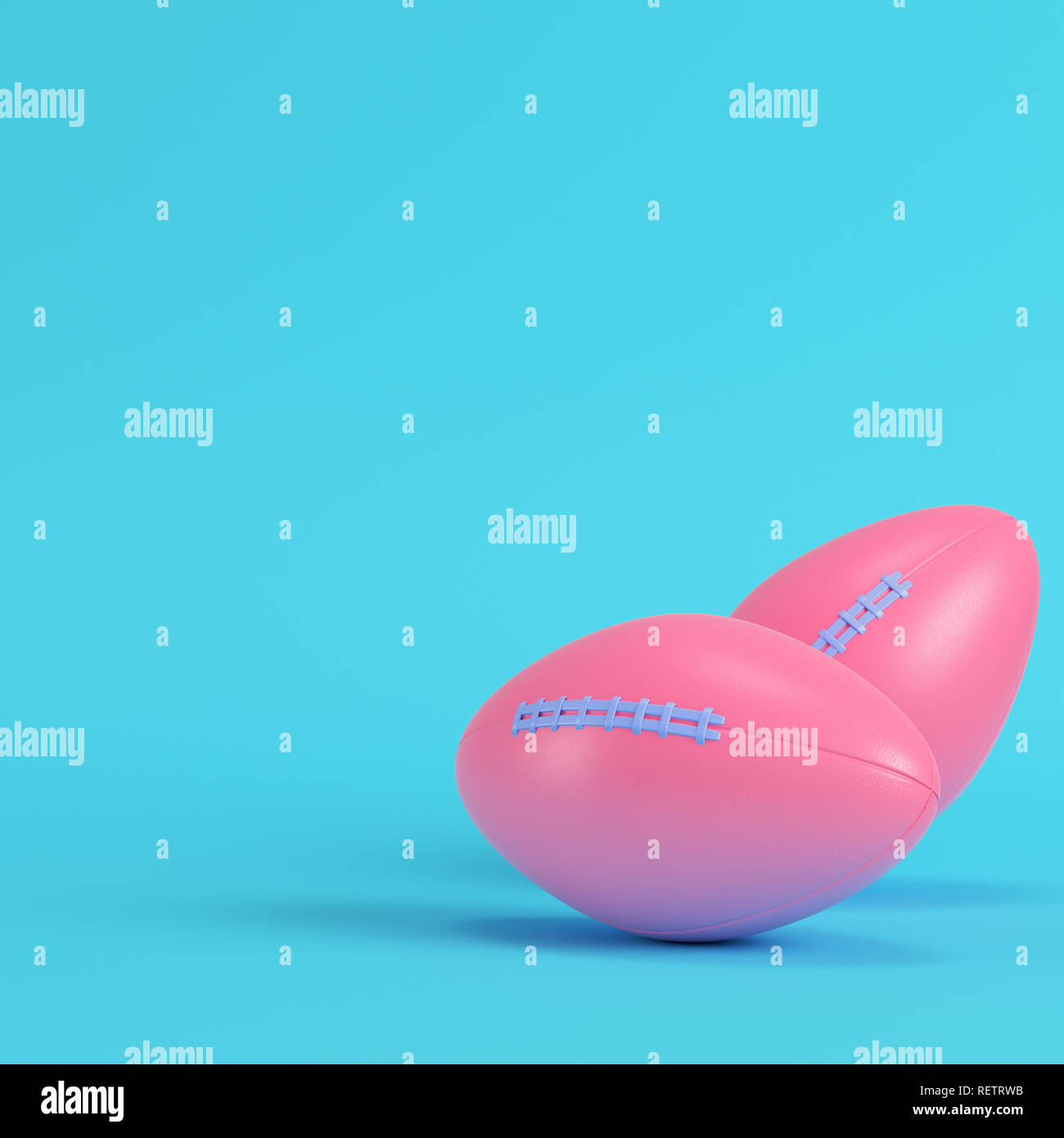 Pink american football ball on bright blue background in pastel colors ...