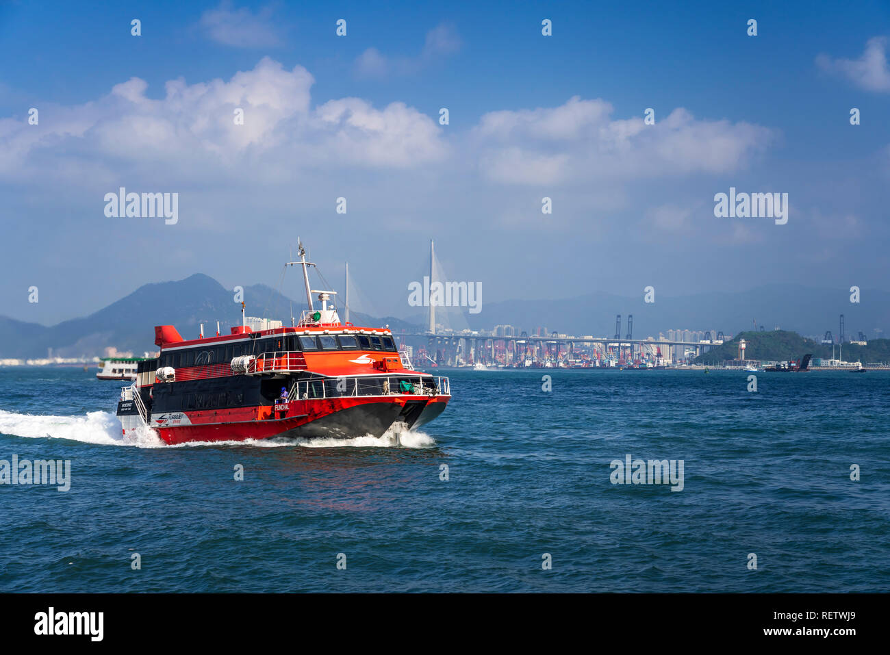 Turbo Jet Macau ferry boat traffic in Victoria Harbor, Hong Kong, China ...