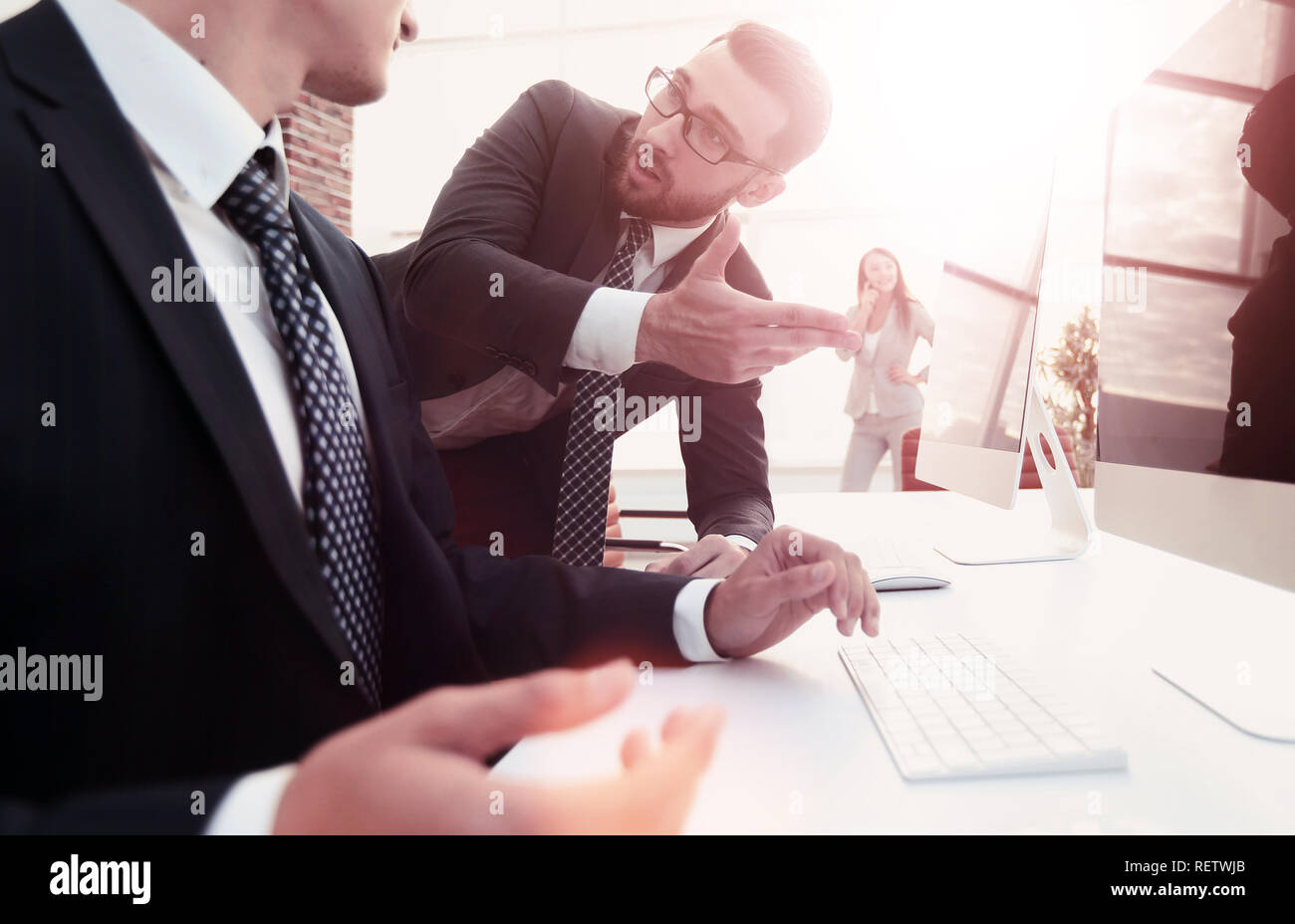 Colleagues In Discussion Stock Photo - Alamy