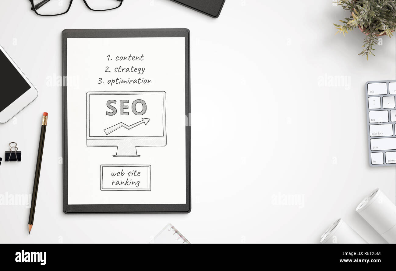 Web site optimization for search engine goals on paper. Top view ...