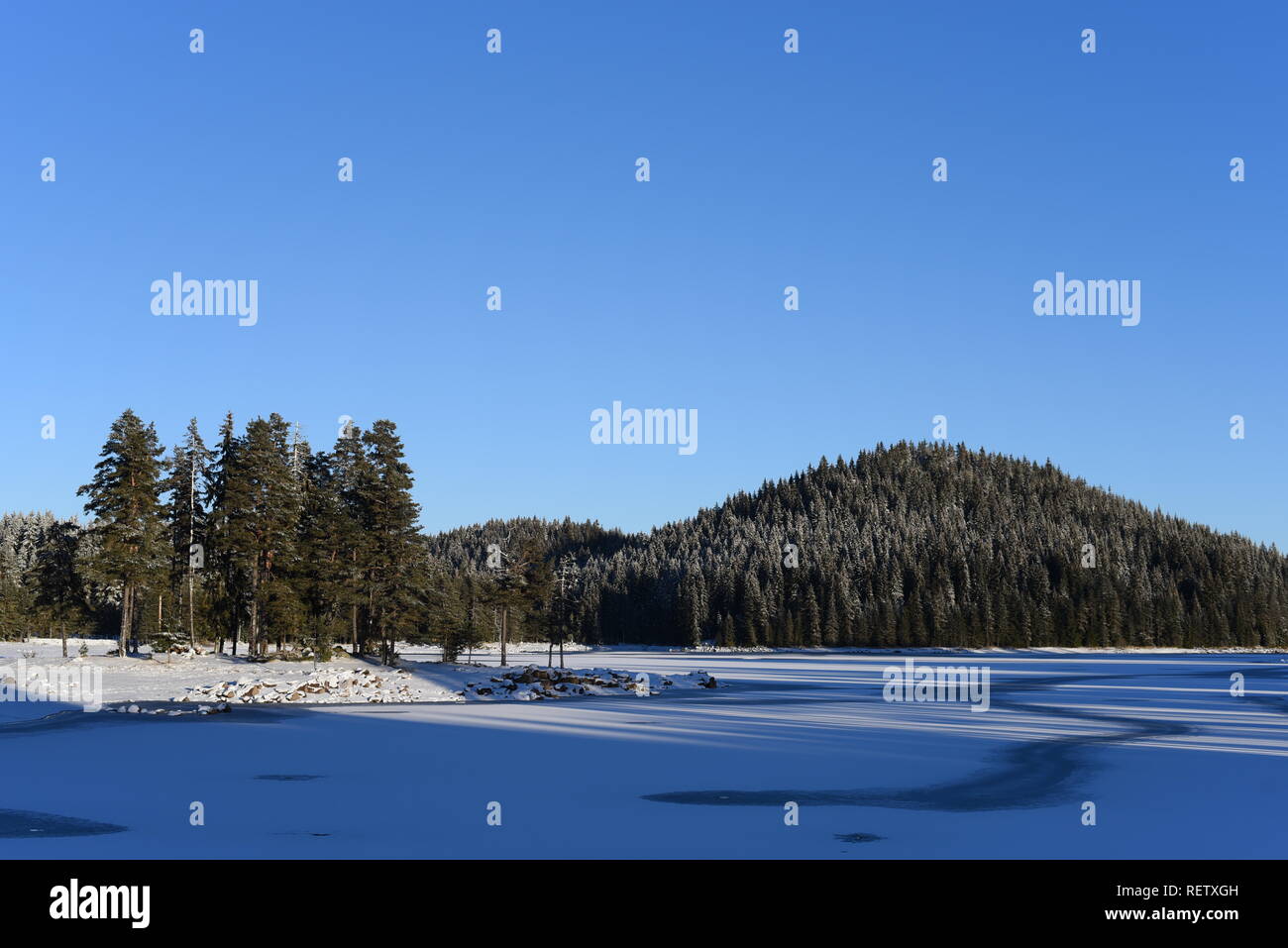 frozen lake in mountain Stock Photo - Alamy