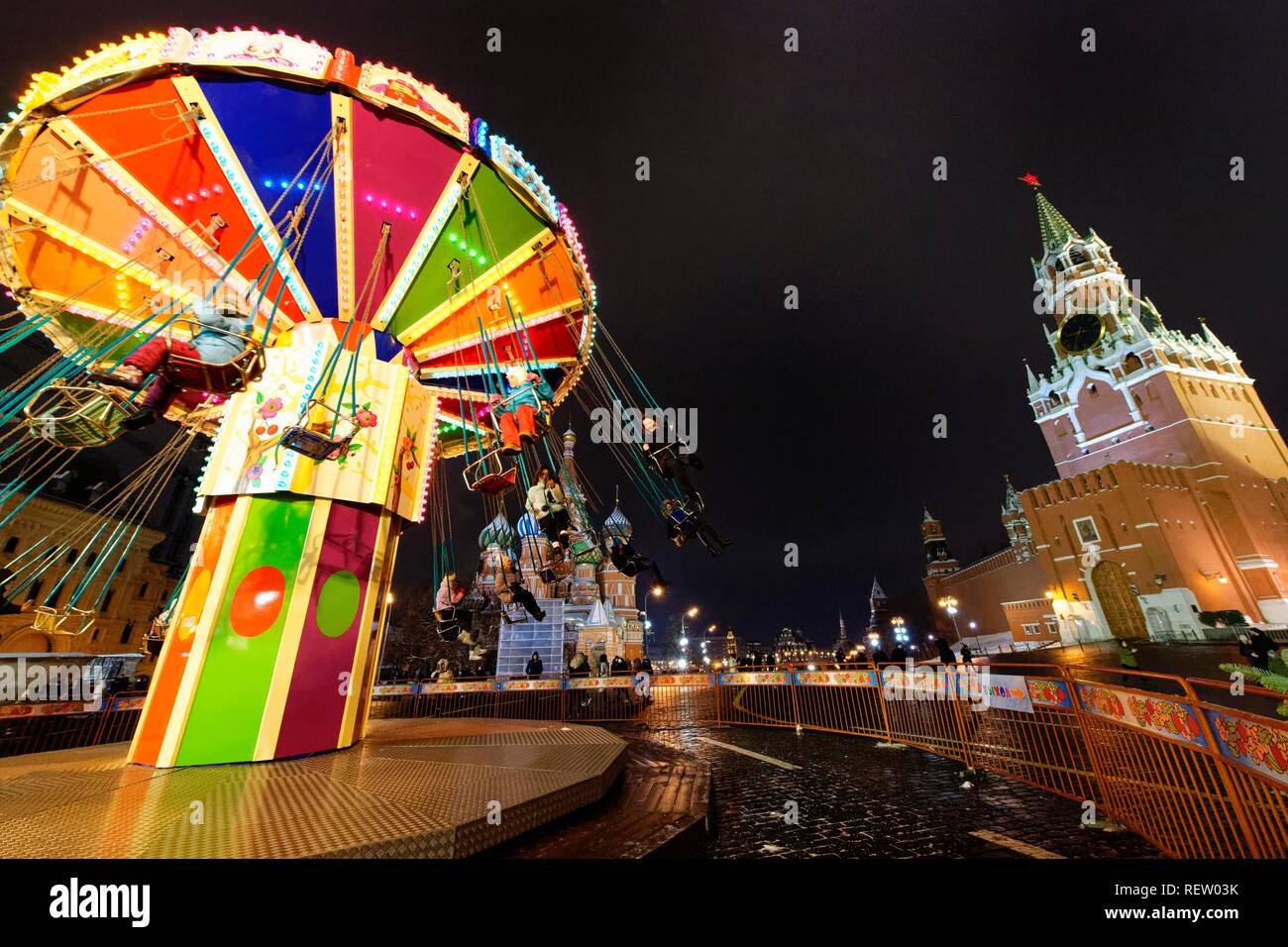 Chain carousel at the Christmas market next to the GUM ice rink, GUM ...