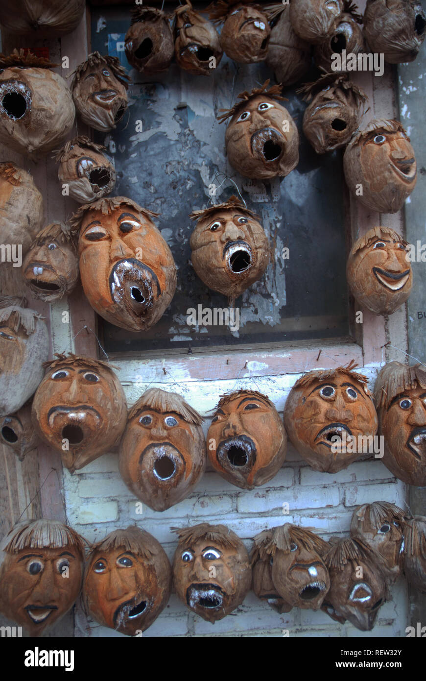 Carved coconut face head hi-res stock photography and images - Alamy
