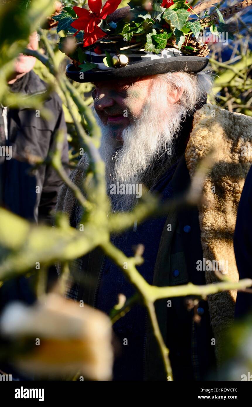 Man with grey hair & beard wearing decorated hat at the Wassail ...