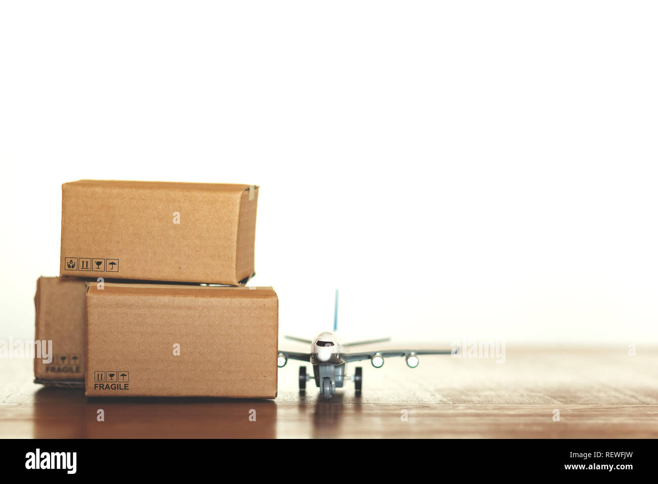 Cartons and airplane with copy space Stock Photo - Alamy