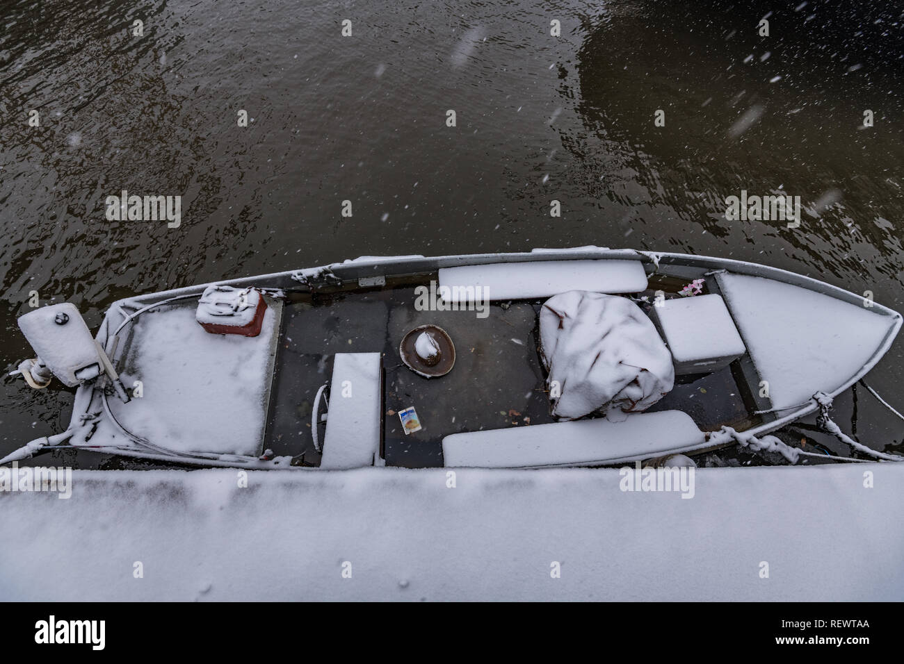 snow covered small boat Stock Photo - Alamy