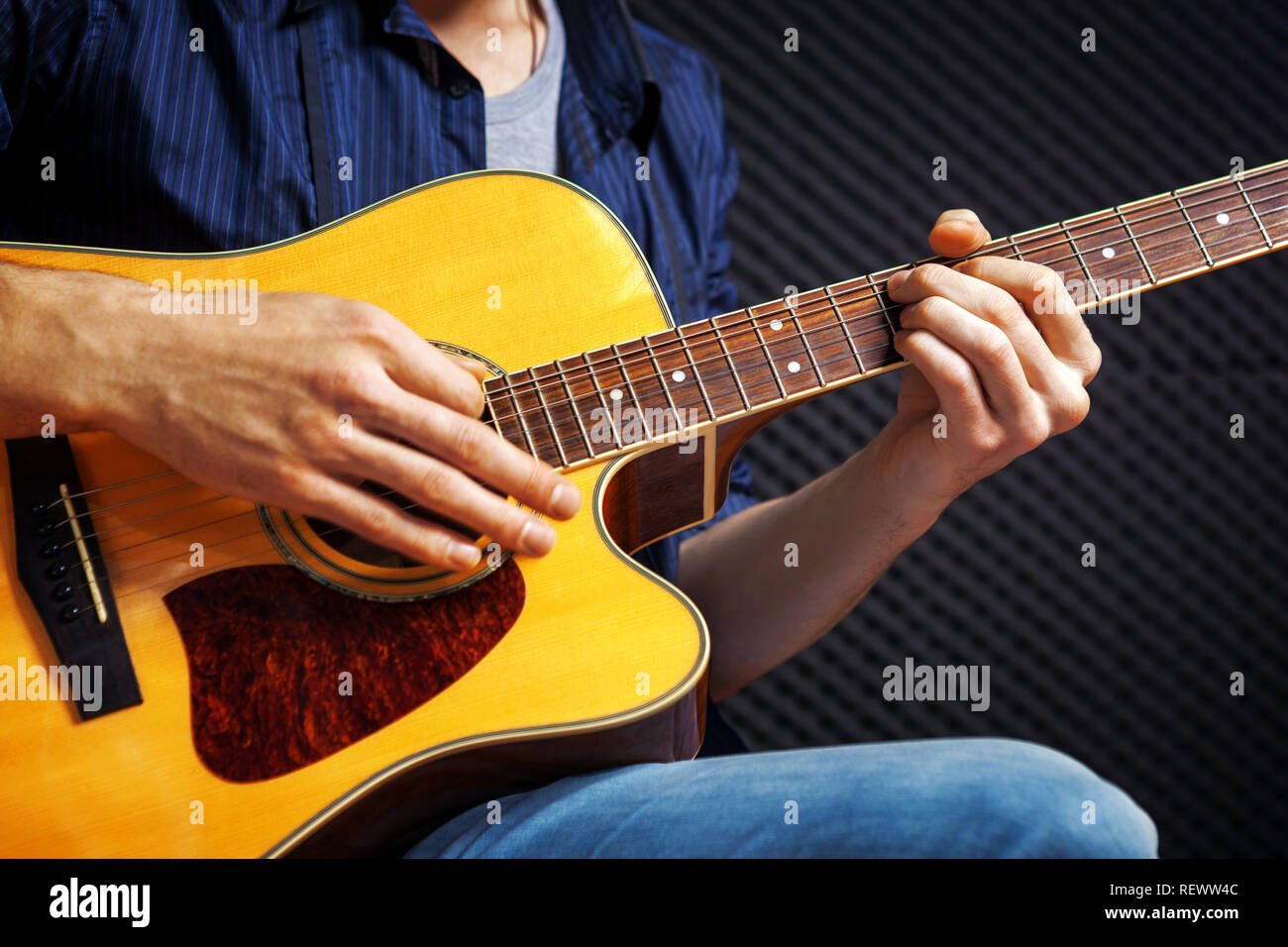 Rock guitarist practicing in sound studio Stock Photo - Alamy