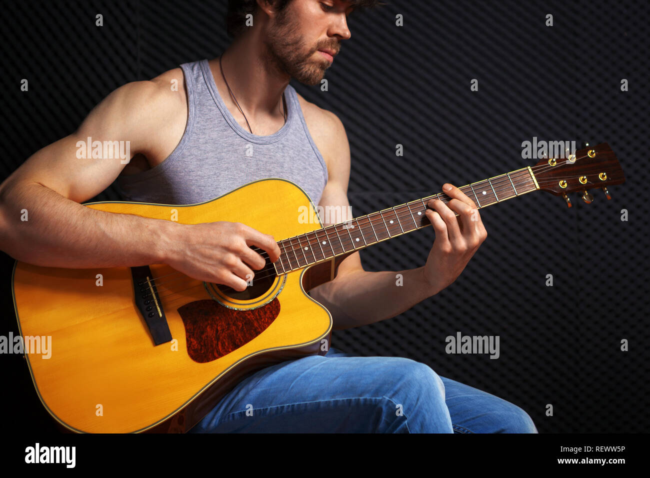 Handsome rock guitarist practicing hi-res stock photography and images ...