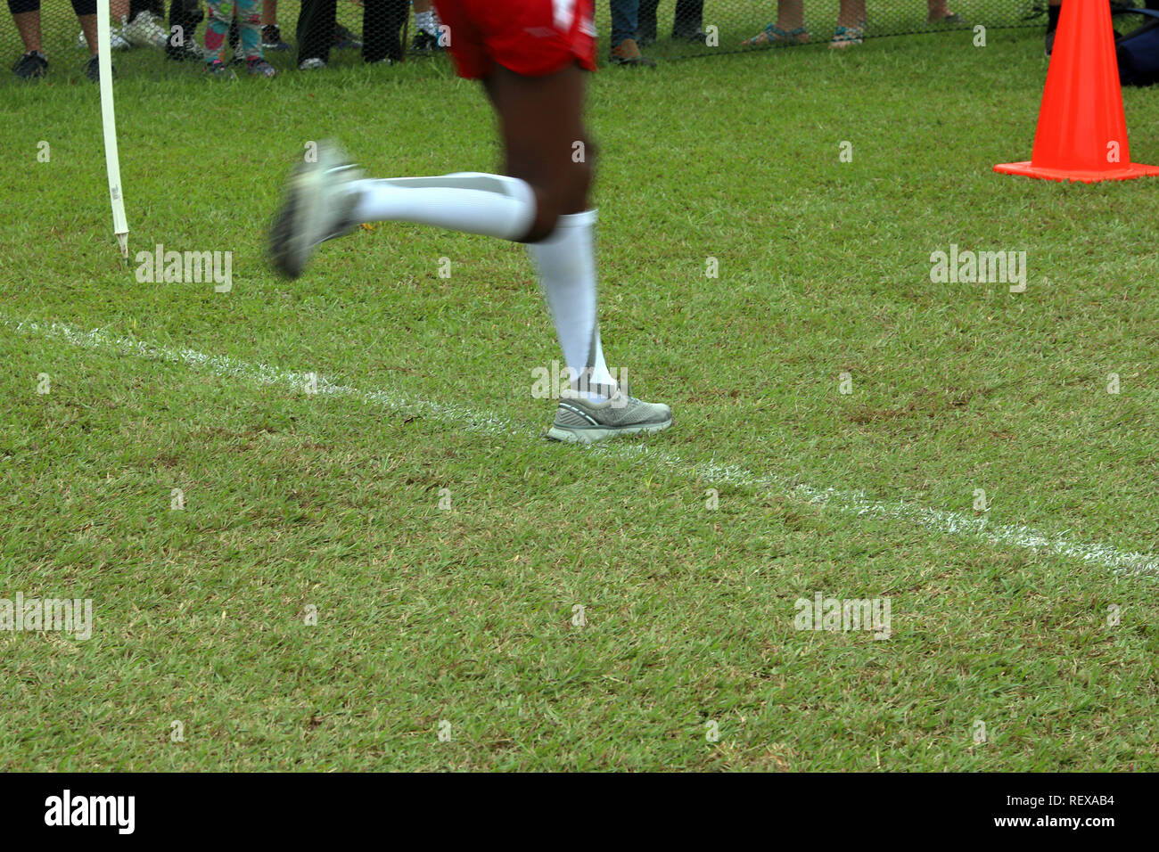 Runner crossing finish line hi-res stock photography and images - Alamy