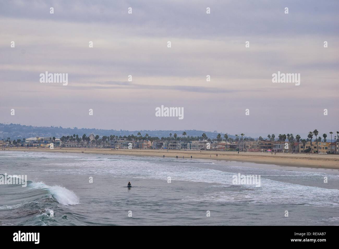 View from Mission Beach in San Diego, of Piers, Jetty and sand, around ...