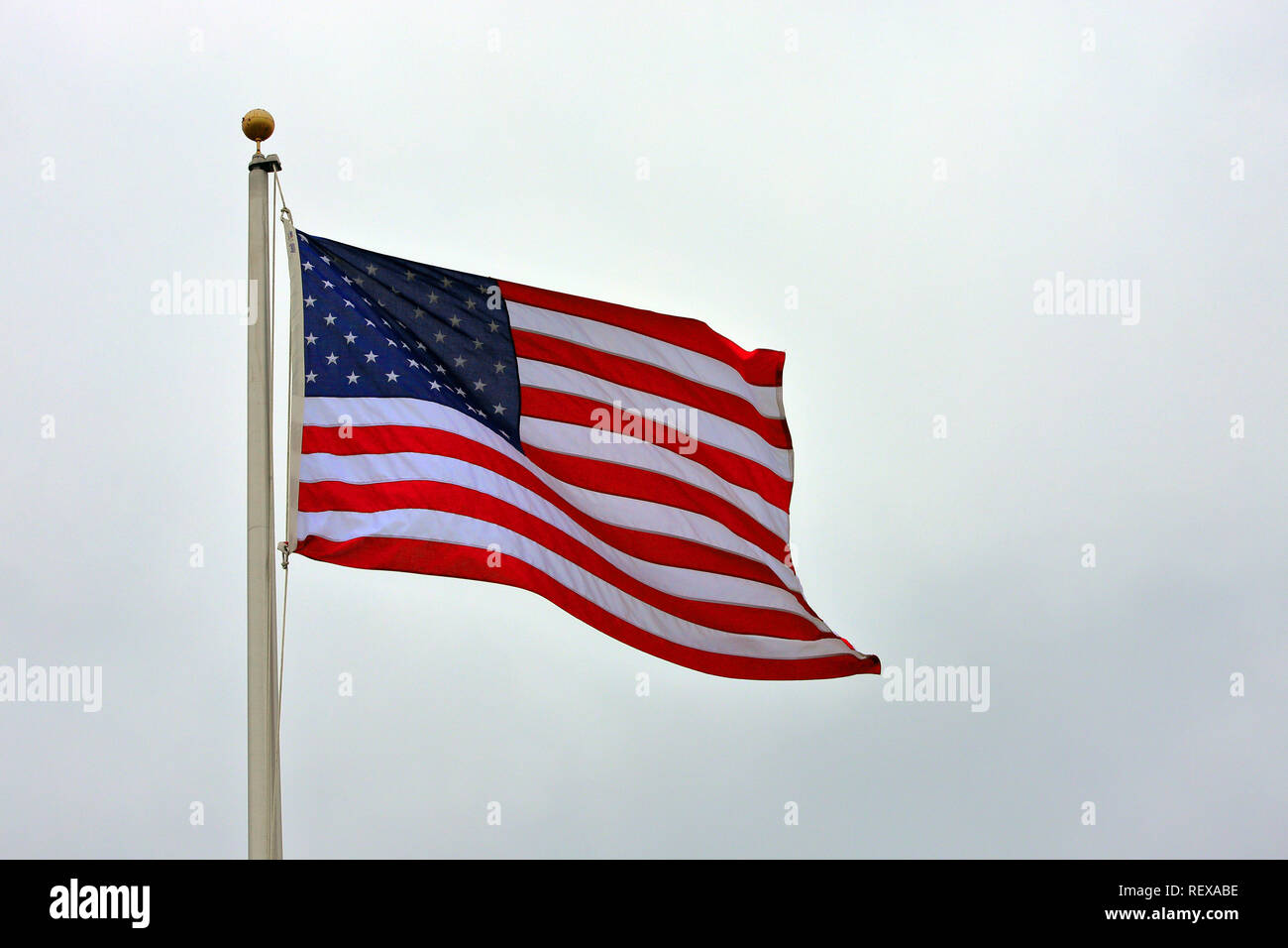 Waving flag pole hi-res stock photography and images - Alamy