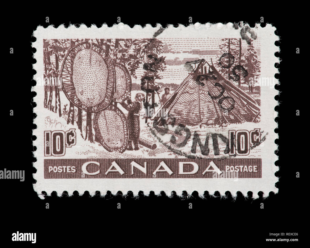 Postage stamp from Canada depicting Indians drying skins on stretchers ...
